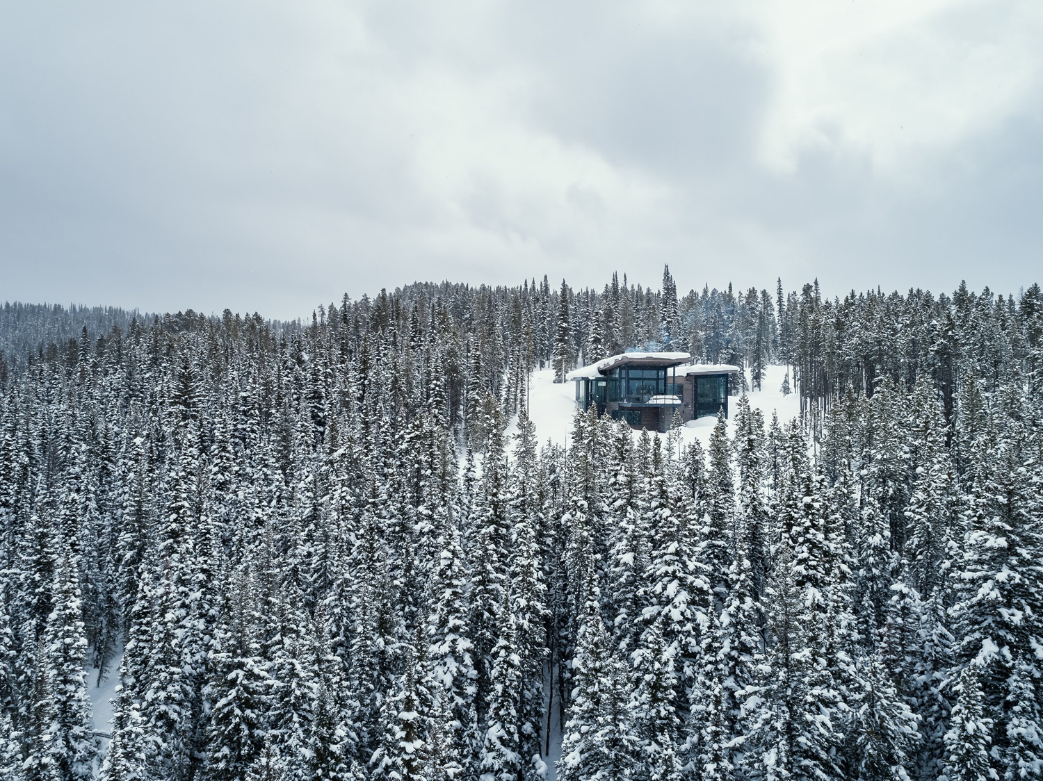 Gabe Border Puts on His Snowshoes to Photograph a Home at the Base of ...